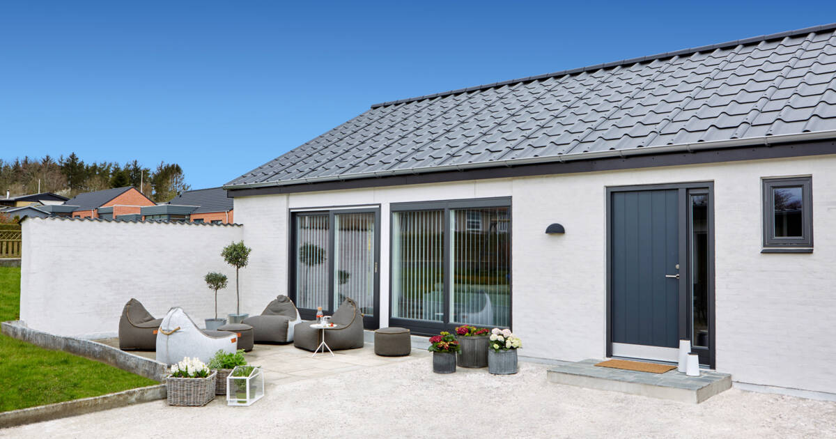 Total renovering af hus med nyt tag og facade. - Swisspearl